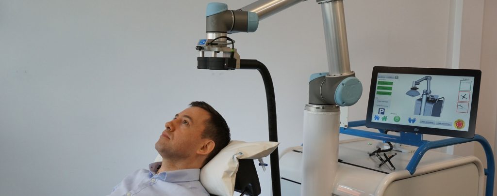 A robot to assist in transcranial magnetic stimulation (TMS / rTMS ...
